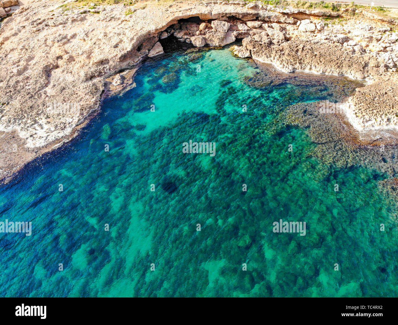 Aerial view of Las Rotas rocky beach in Denia, Spain at sunset Stock ...