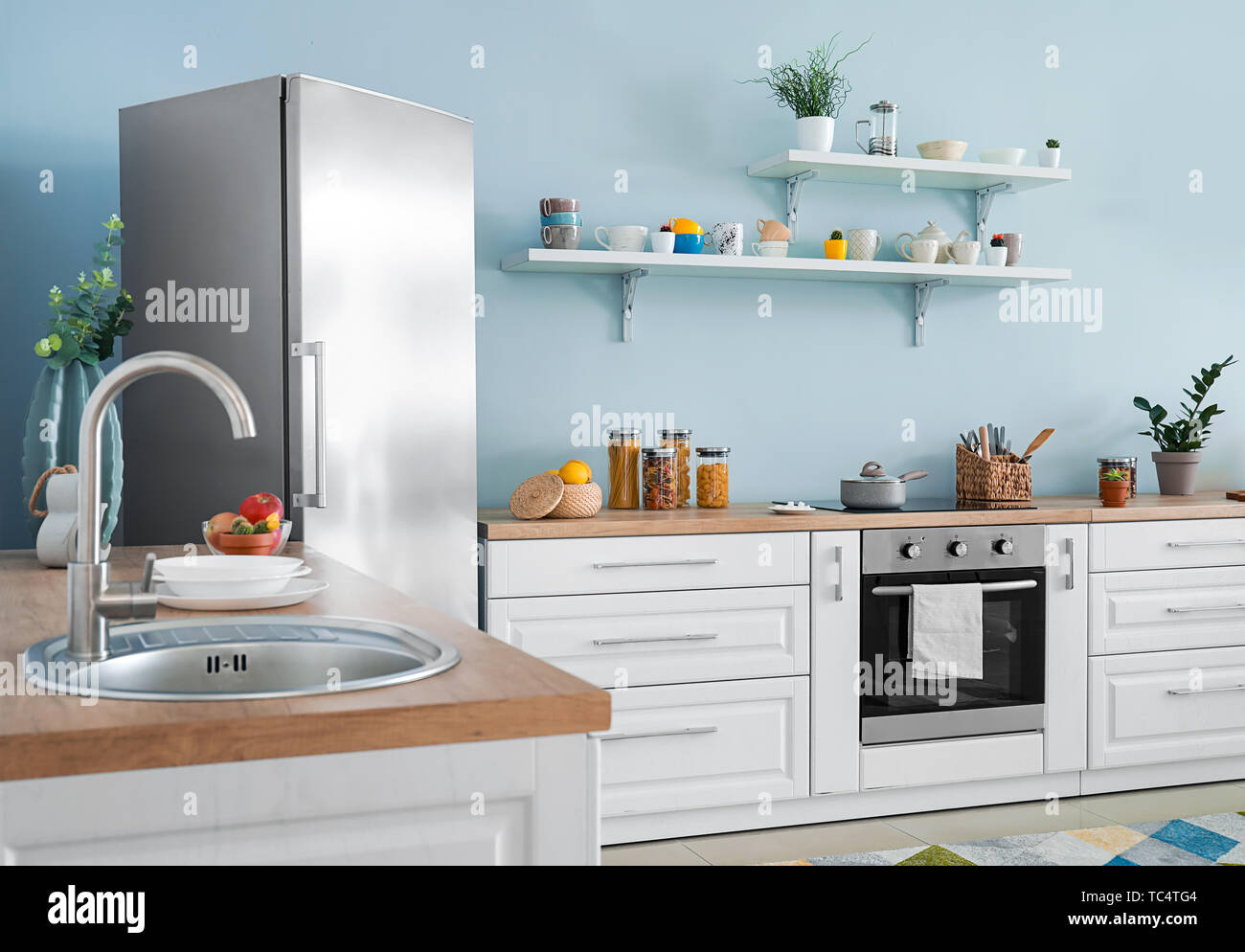 Interior of modern comfortable kitchen Stock Photo - Alamy
