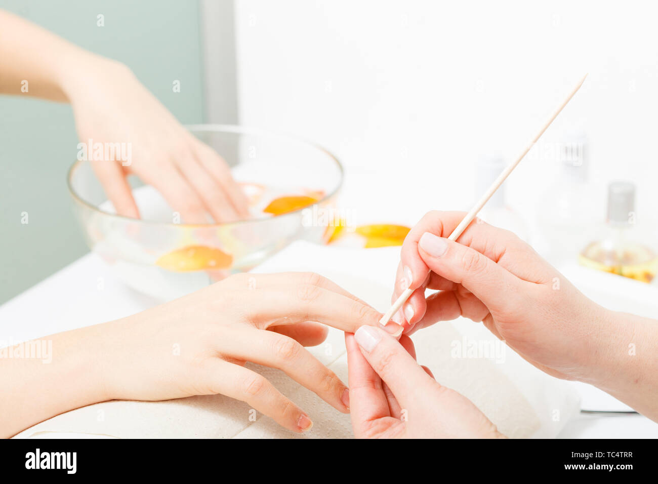 Nail care, beauty wellness spa treatment concept. Woman preparing nails ...