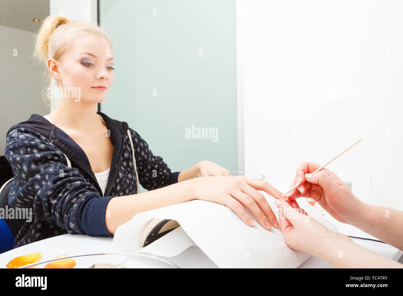 Nail care, beauty wellness spa treatment concept. Woman preparing nails ...