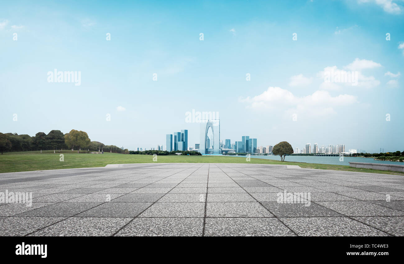 empty brick floor and cityscape of modern city Stock Photo - Alamy