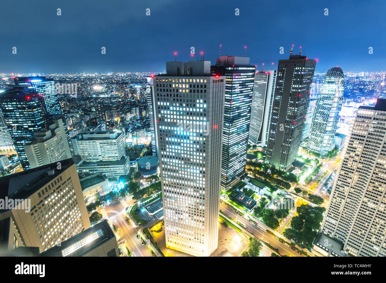 modern office buildings in downtown of tokyo at night Stock Photo - Alamy