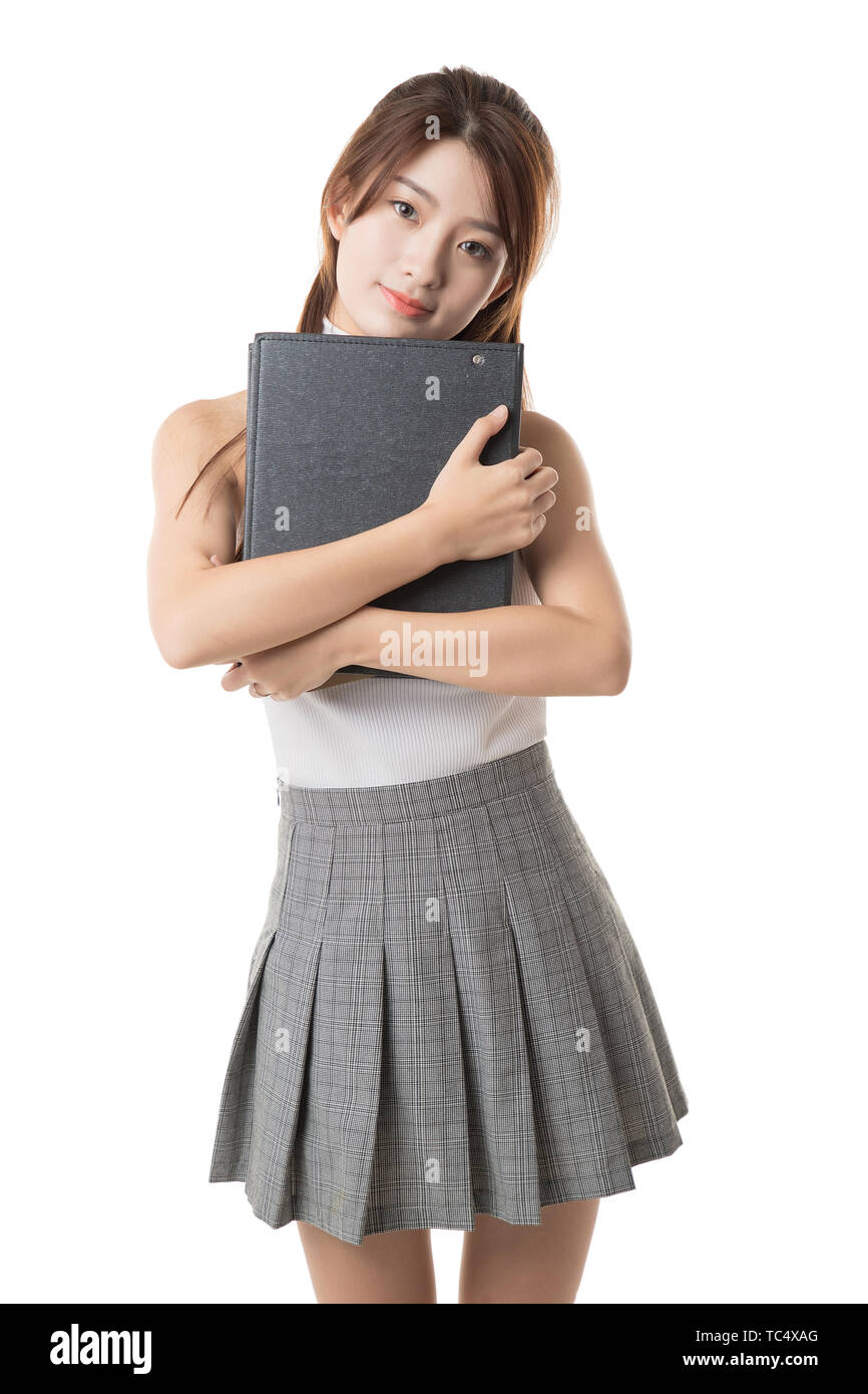 Beautiful cute college student against white background Stock Photo - Alamy