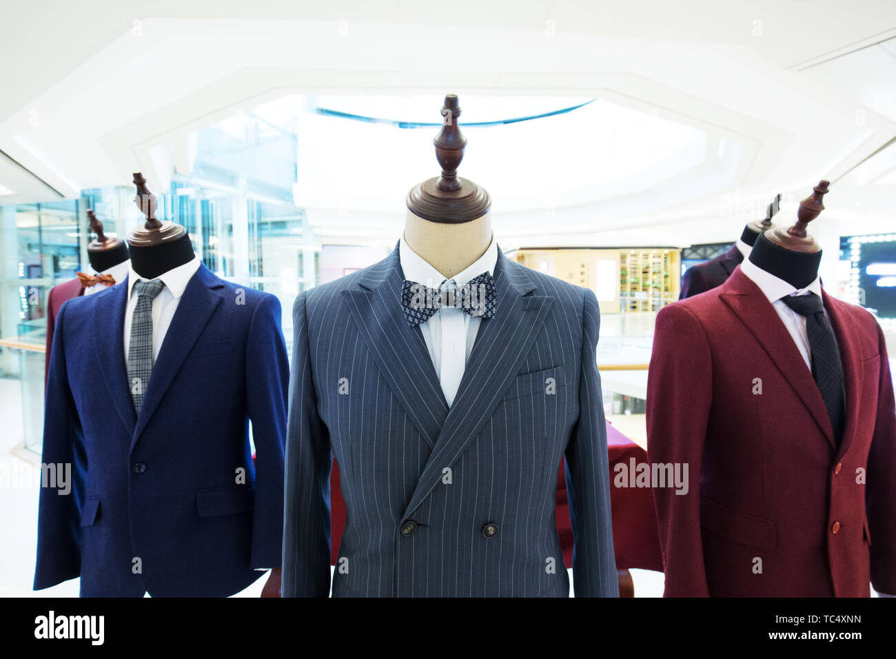 businessman suit on model in shopping mall Stock Photo - Alamy