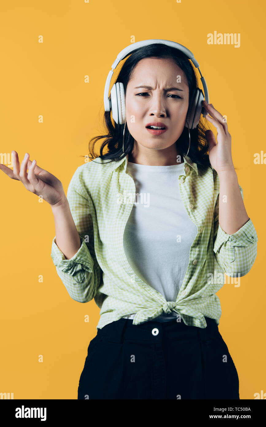 Confused asian girl hi-res stock photography and images - Alamy