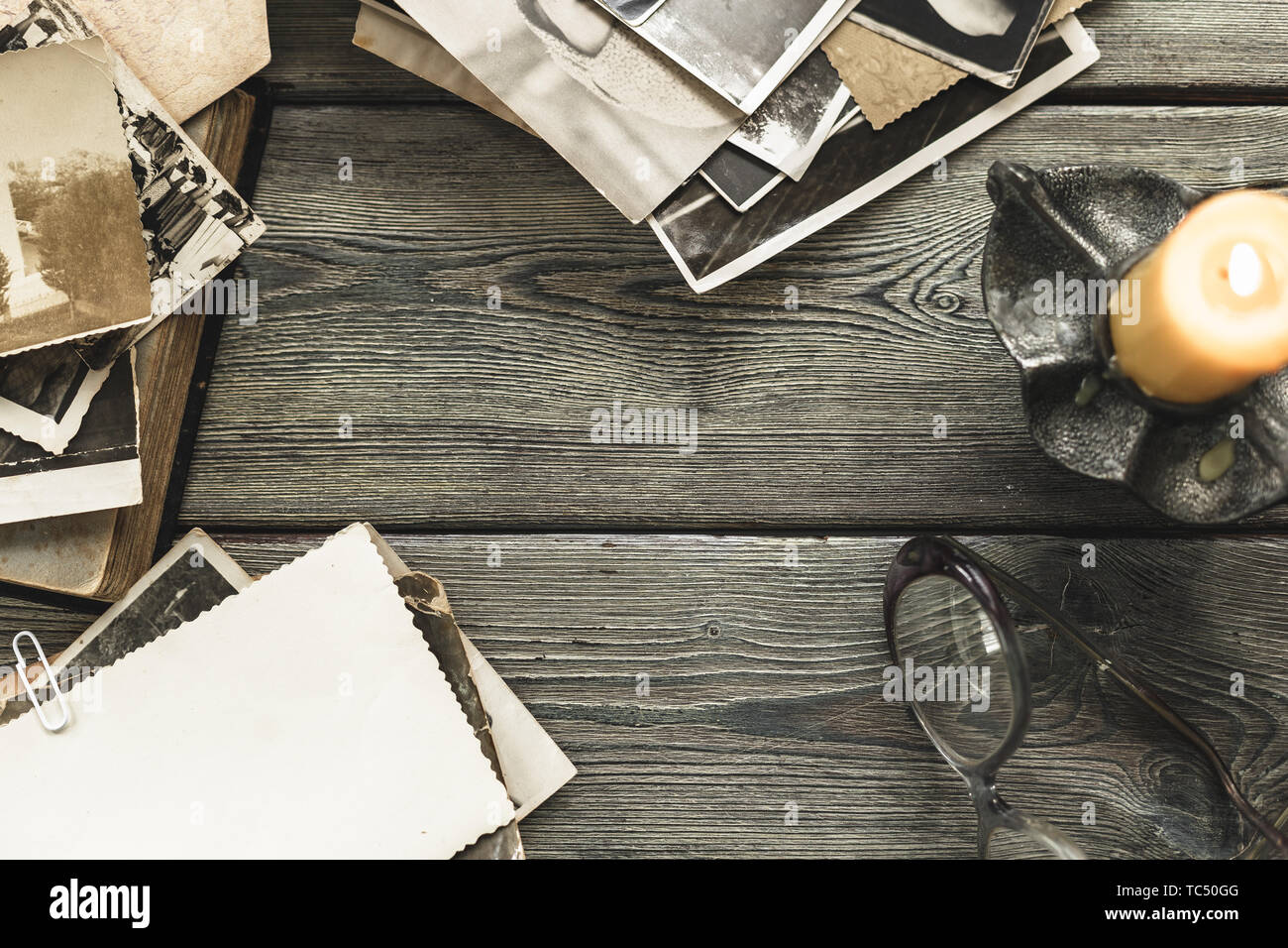 retro some old photos on wooden table Stock Photo - Alamy