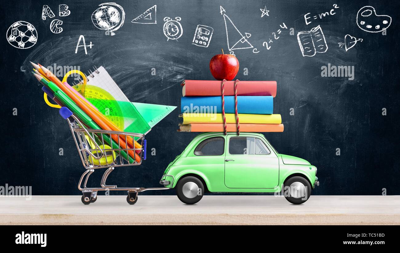 Back to school. Car delivering books and apple against school ...