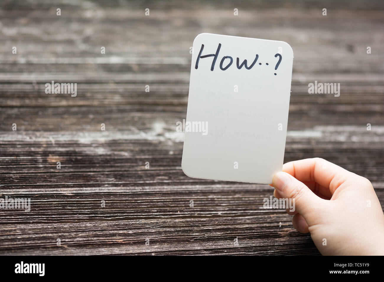 Reynolds card with text on old wood plate Stock Photo - Alamy