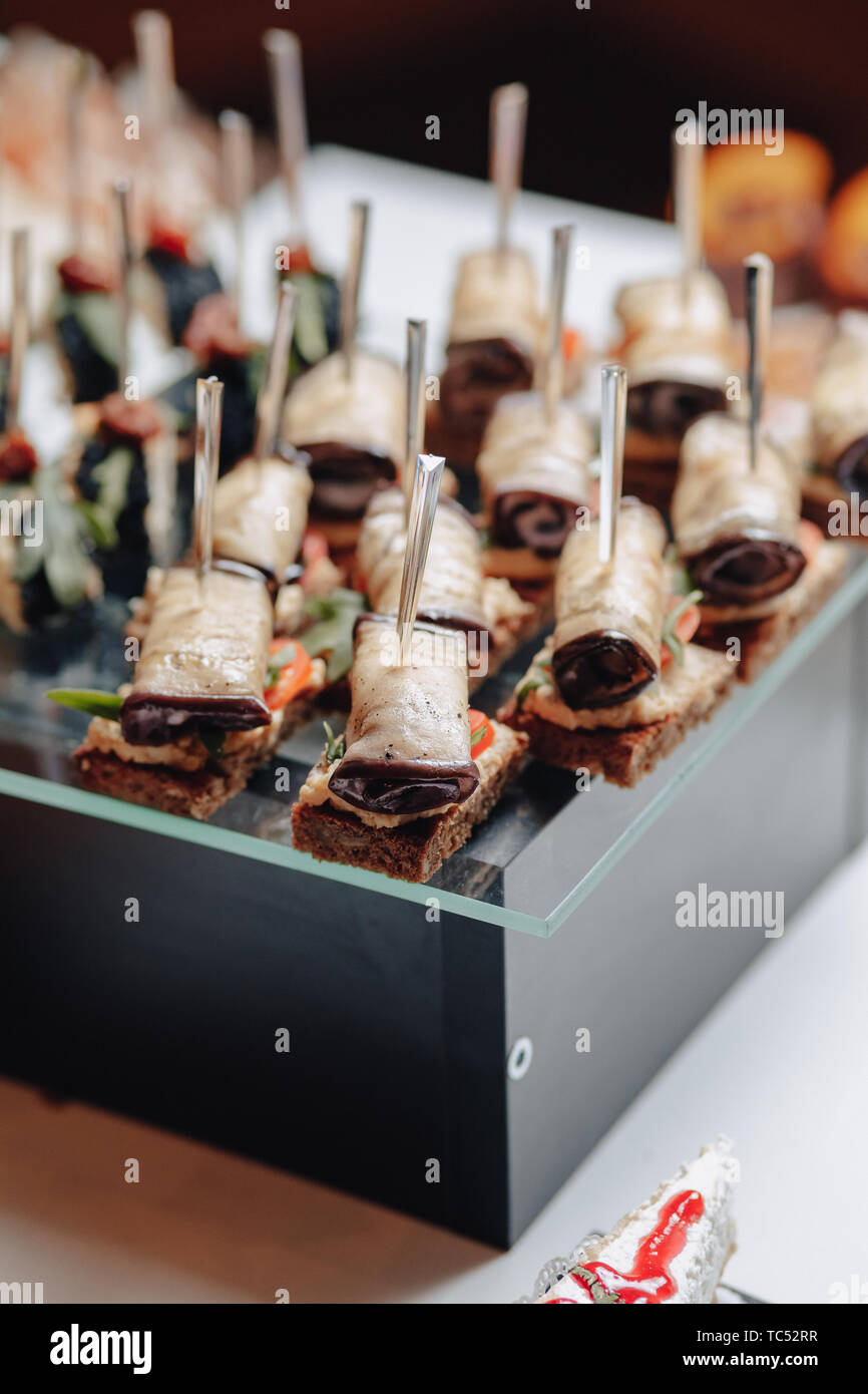 delicious festive buffet with canapés and different delicious meals ...