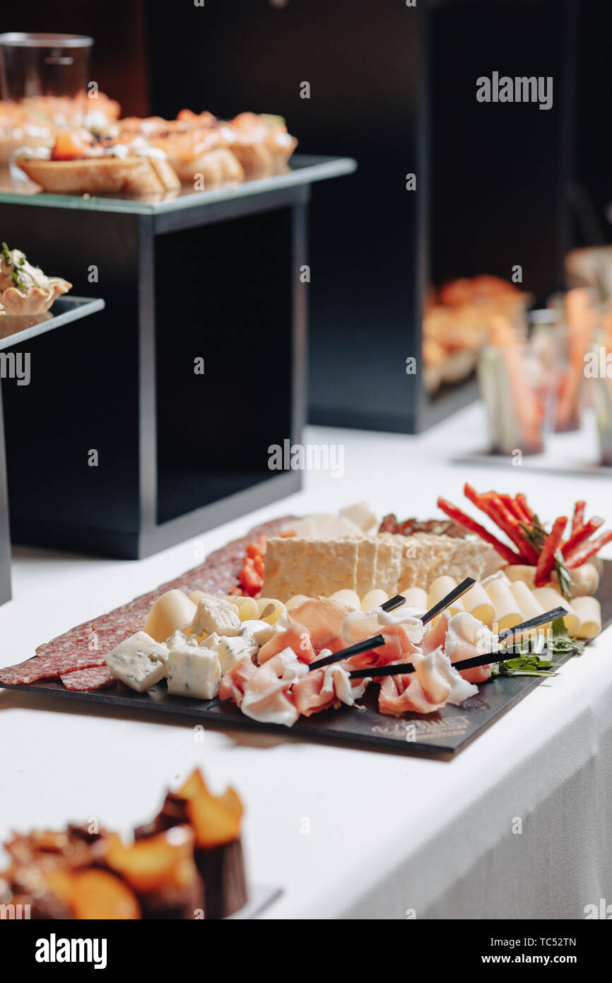 delicious festive buffet with canapés and different delicious meals ...