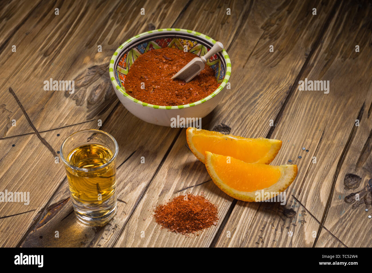Mezcal - traditional Mexican drink with orange slices and worm salt on ...