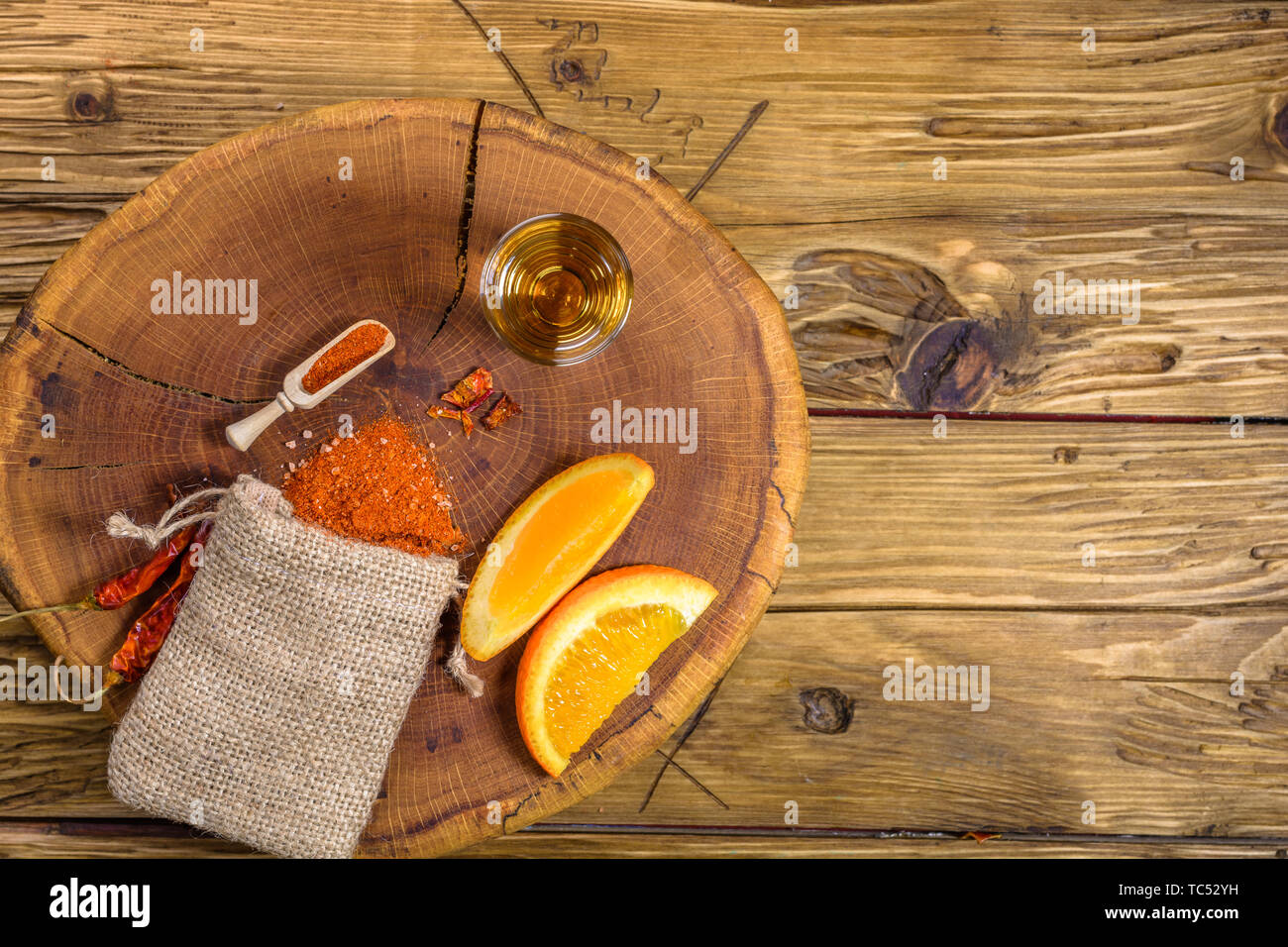Mezcal mexican drink with orange, lime slices and worm salt in oaxaca ...
