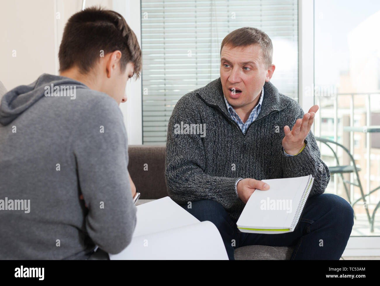 Father scolding son hi-res stock photography and images - Alamy