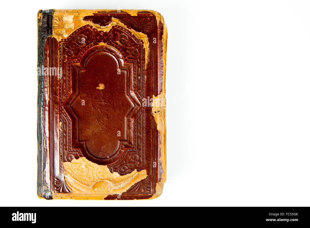 Top view on vintage book with claret leather textured cover on white ...