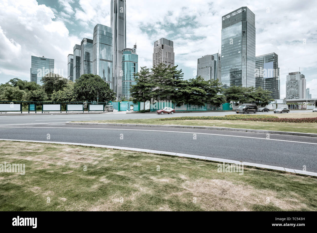 Modern city street and skyscrapers Stock Photo - Alamy