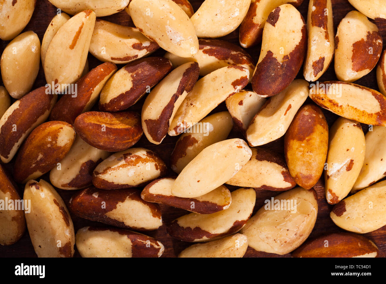 Closeup of shelled roasted Brazil nut seeds as background Stock Photo ...