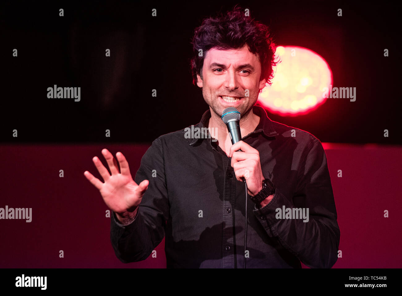 Clint Edwards, stand up comedian, on stage at the Machynlleth Comedy ...