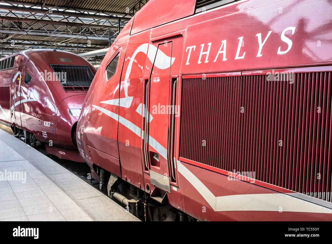 A Thalys high-speed train stationing in Brussels-South railway station ...