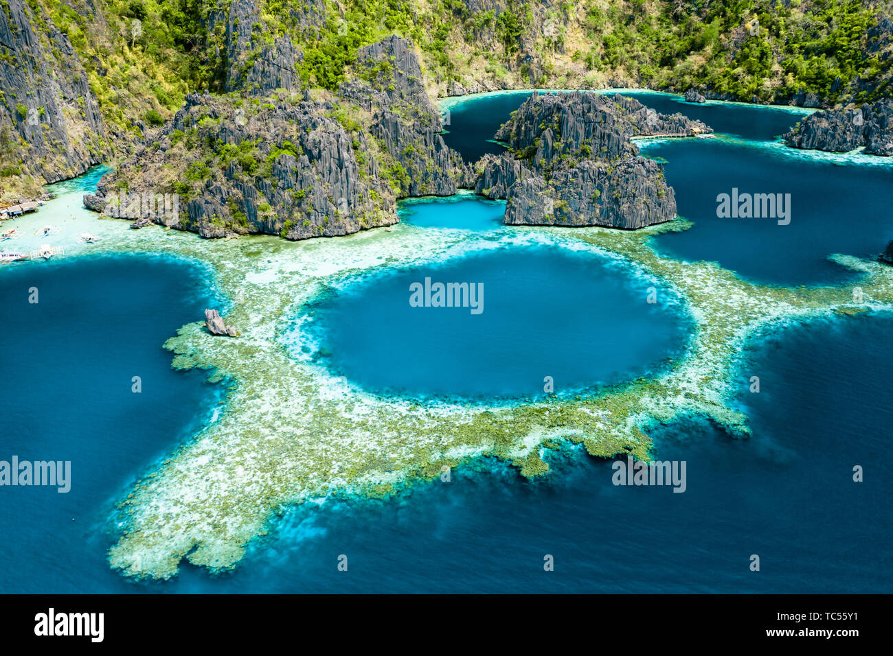 Aerial view of beautiful lagoons and limestone cliffs of Coron, Palawan ...