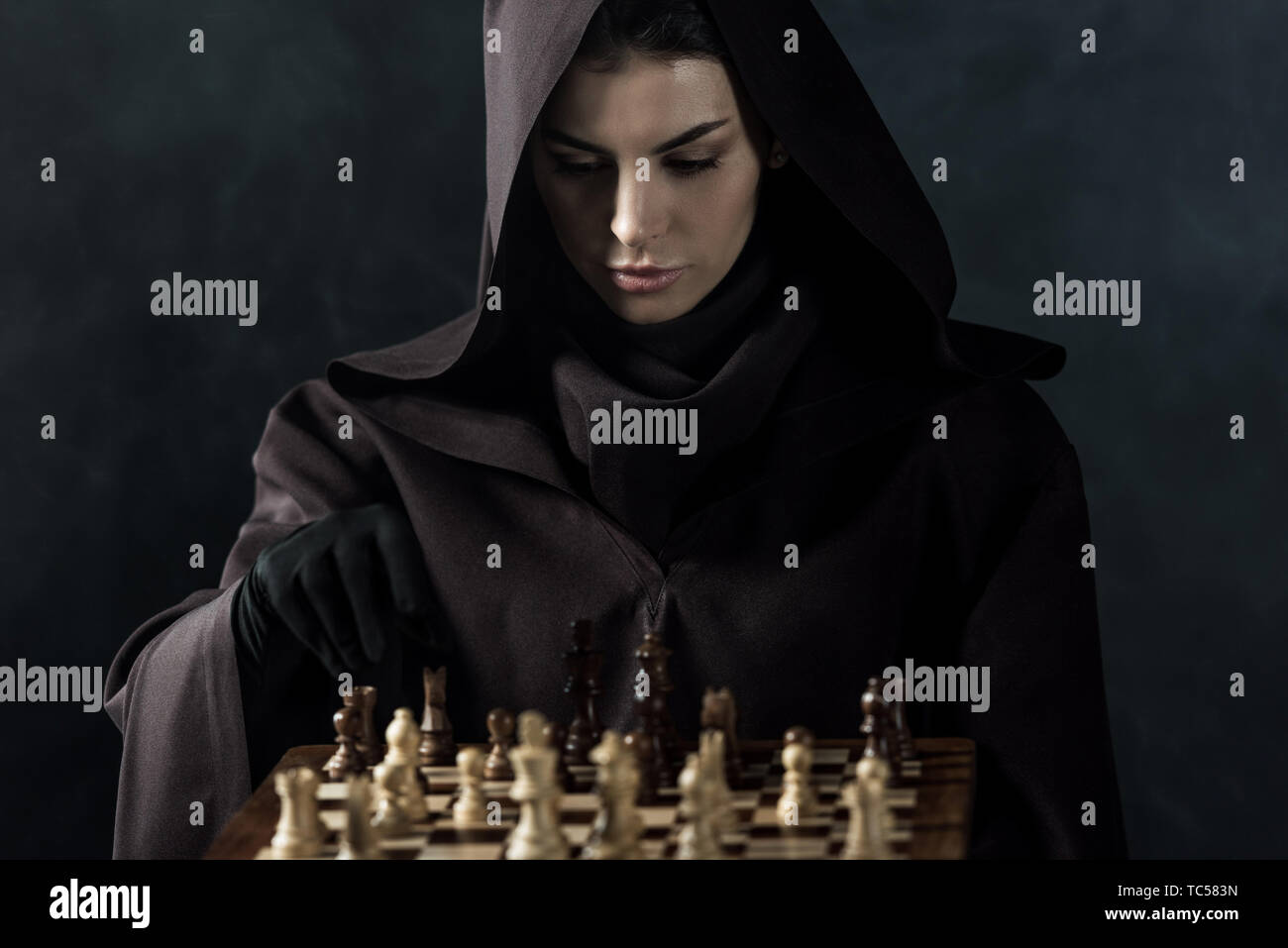Death playing chess hi-res stock photography and images - Alamy