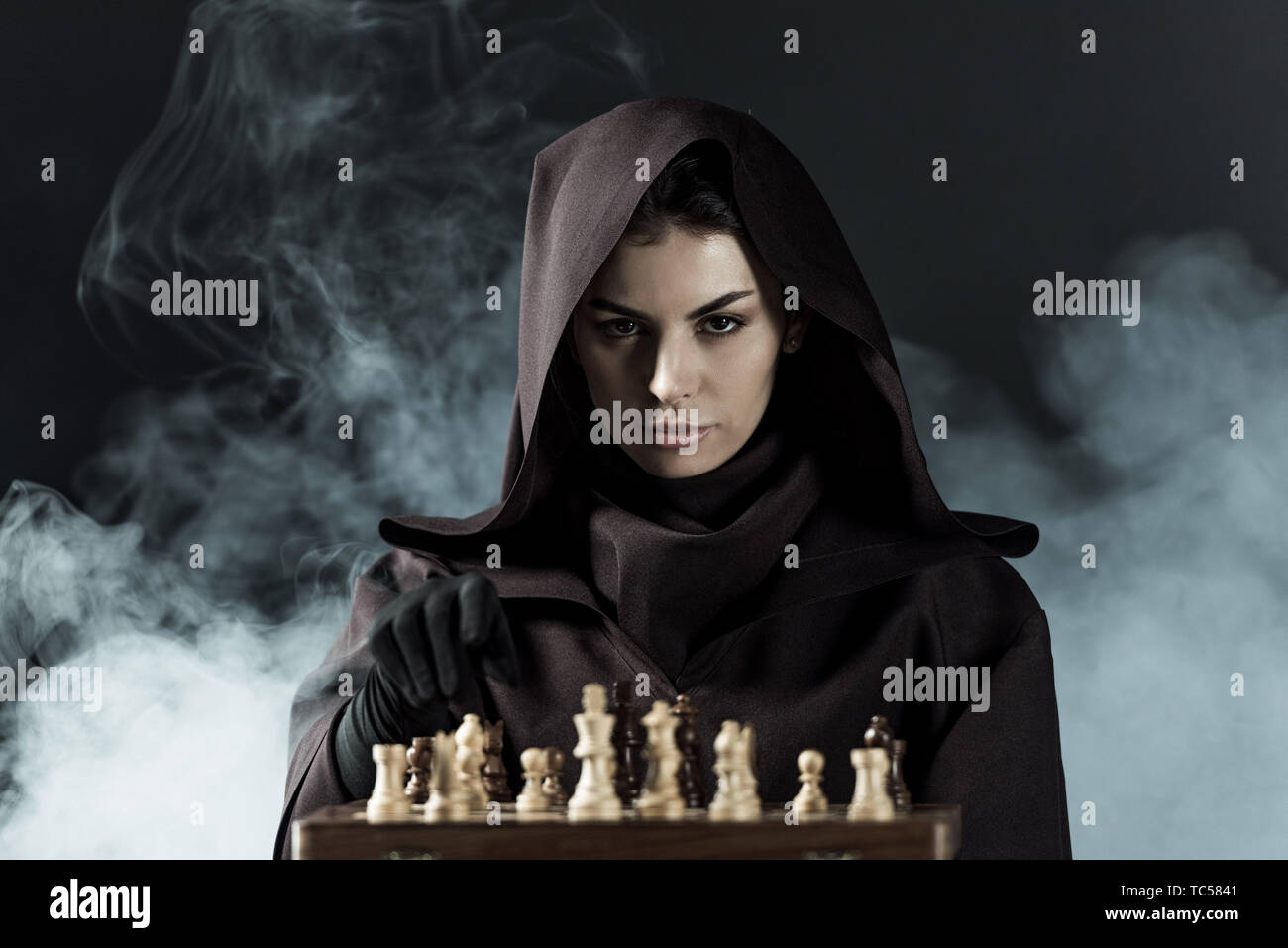Death playing chess hi-res stock photography and images - Alamy