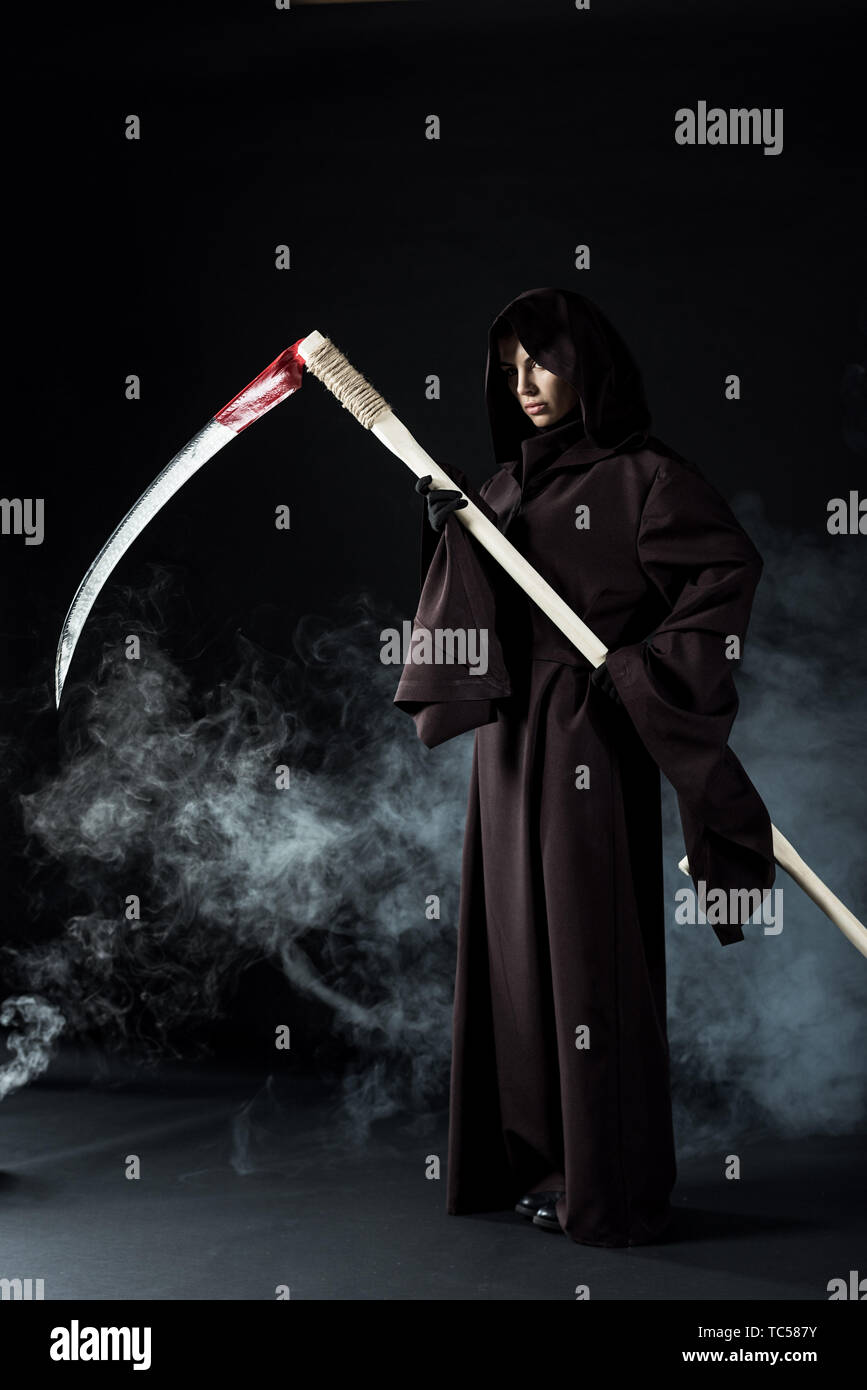 Holding Scythe High Resolution Stock Photography and Images - Alamy