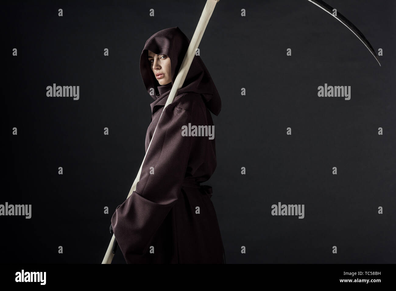 Holding Scythe High Resolution Stock Photography and Images - Alamy