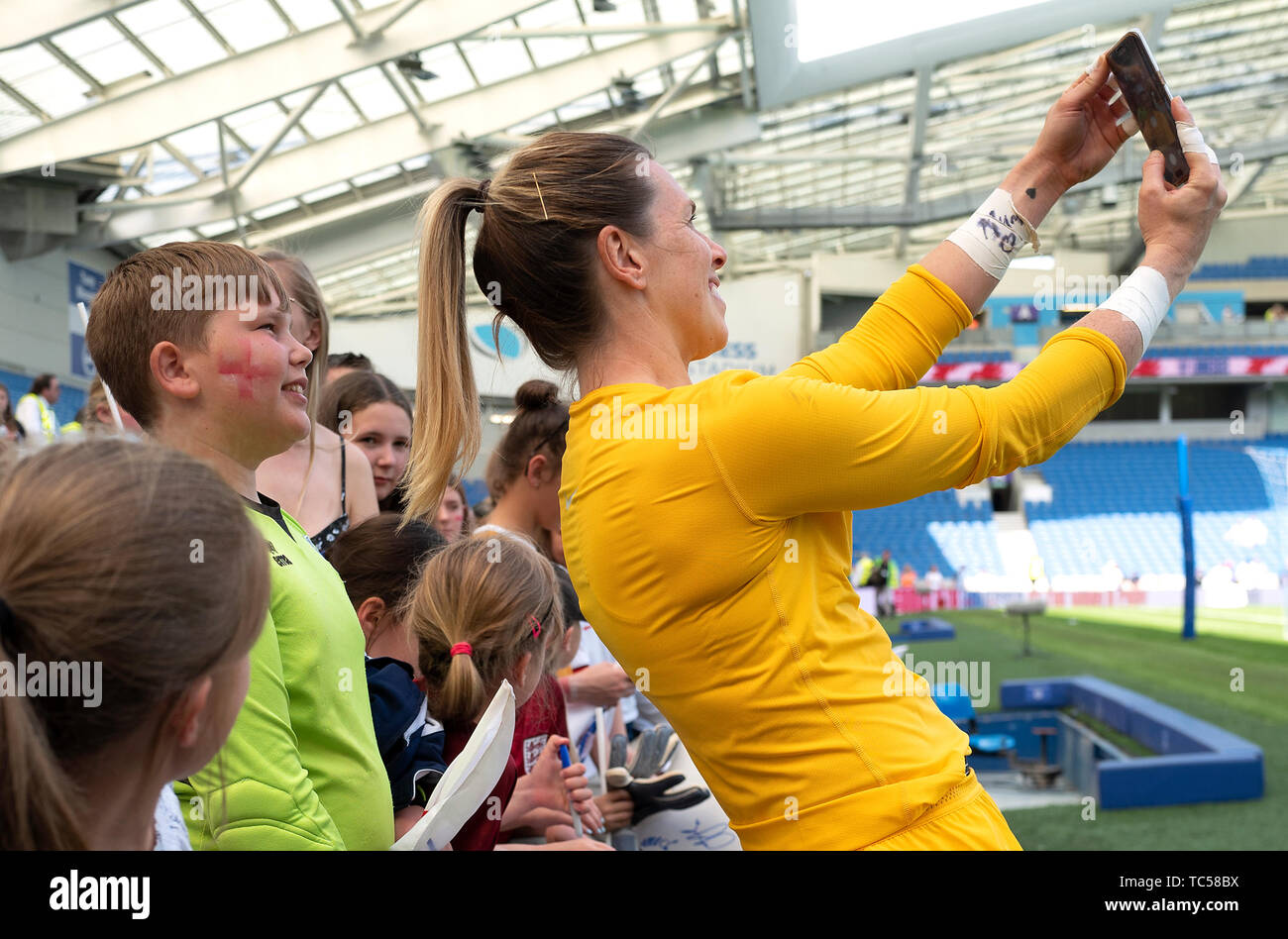England goalkeeper Carly Telford takes a selfie with fans after the ...