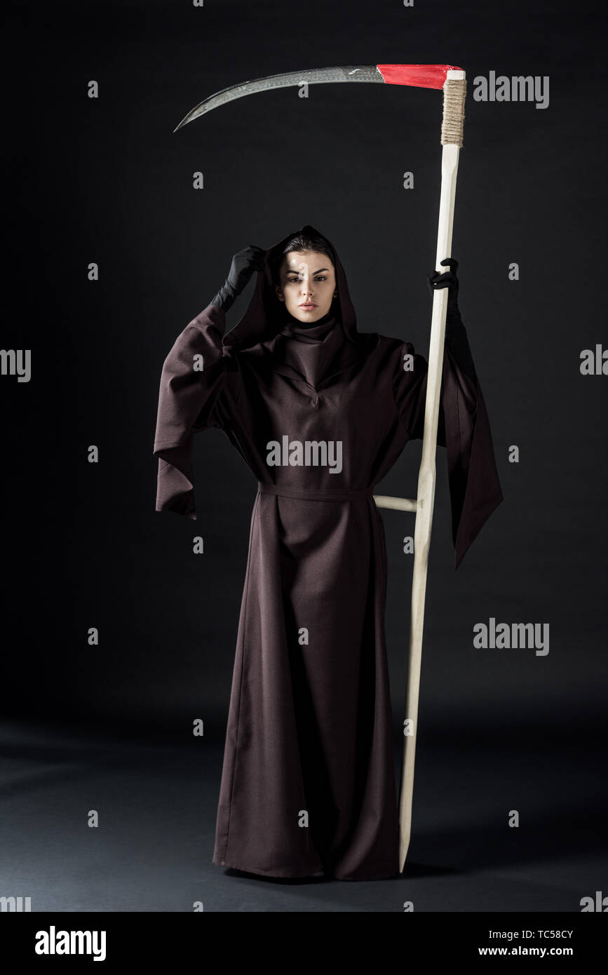 Holding Scythe High Resolution Stock Photography and Images - Alamy