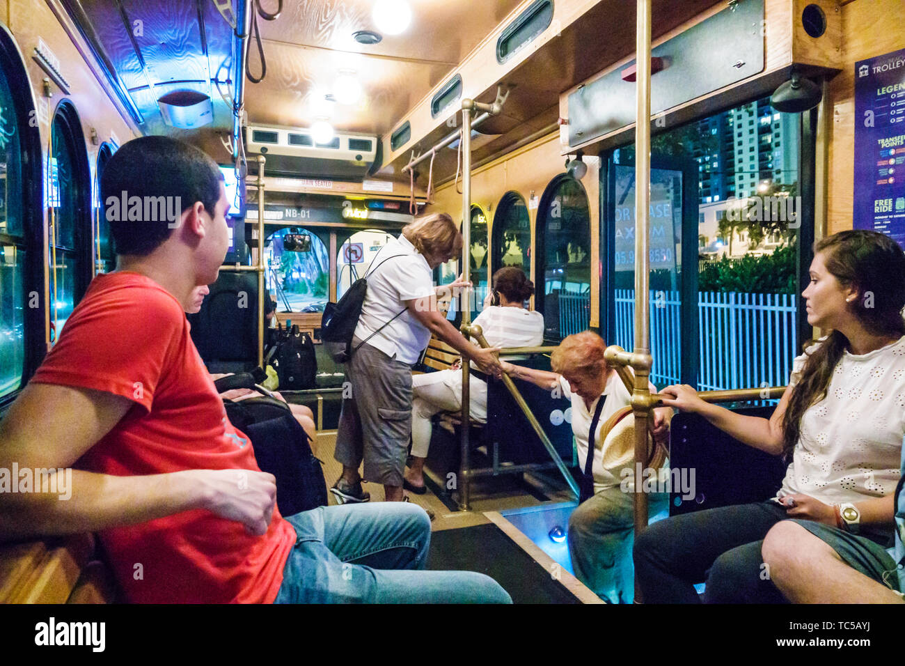 North beach loop free trolley bus hispanic riders passengers hi-res ...
