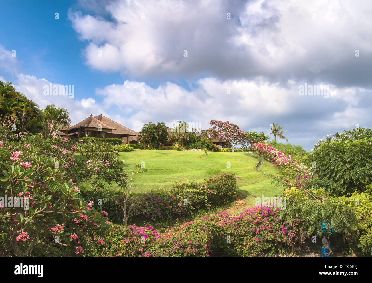 Bali blue sky and white clouds under Indian Ocean resort hotel waves ...