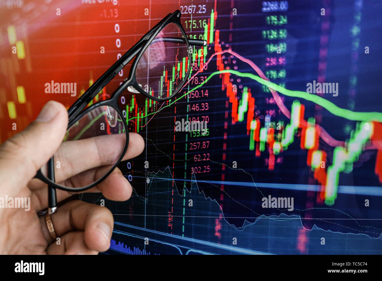 businessman shows the screen on laptop the graph of growth Stock Photo ...