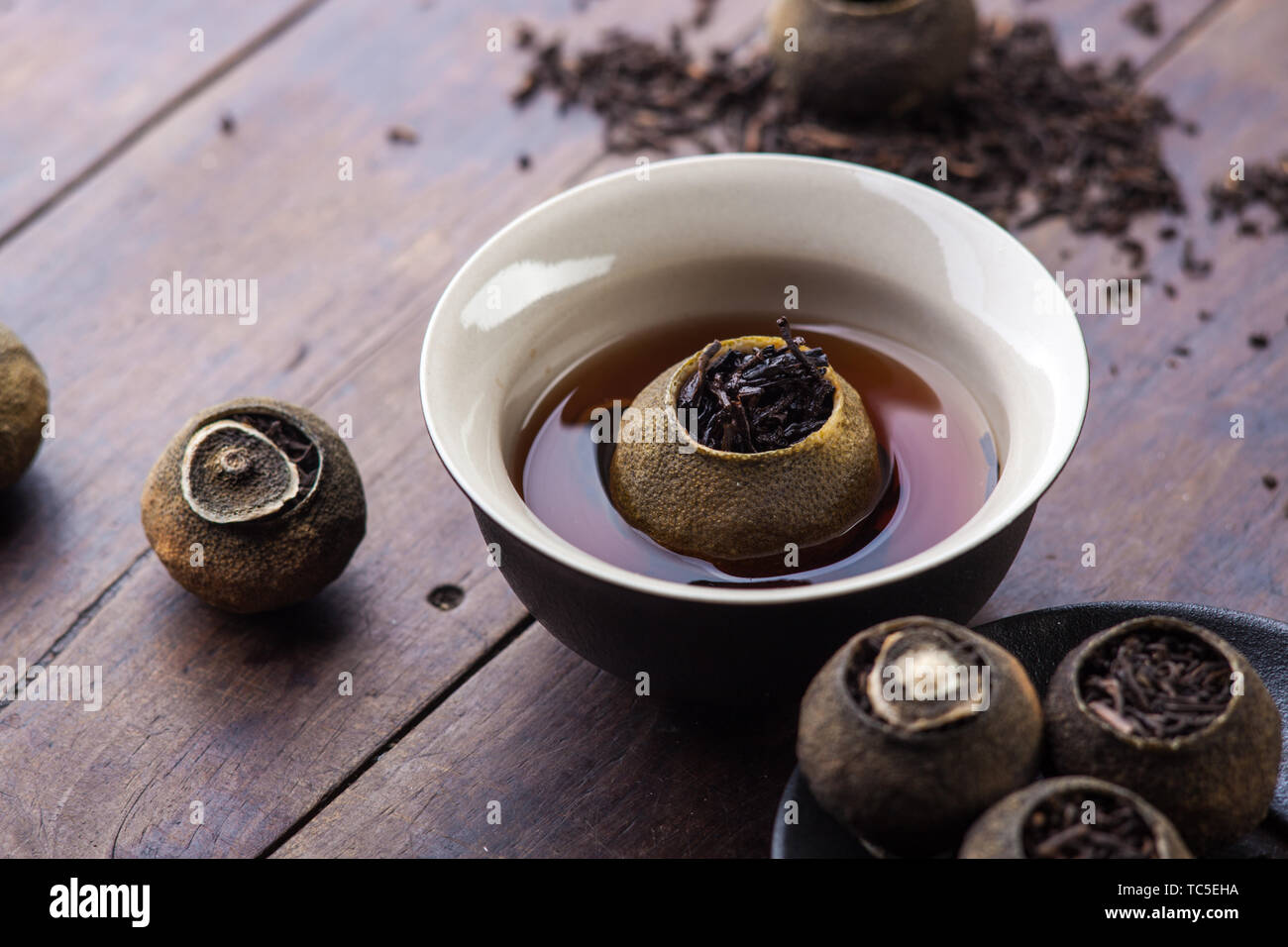 Little green tangerine tea Stock Photo - Alamy