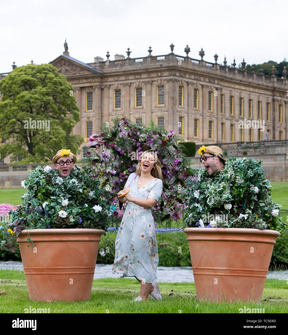 Ellie Mainwaring with a floral parasol made by celebrity florist ...
