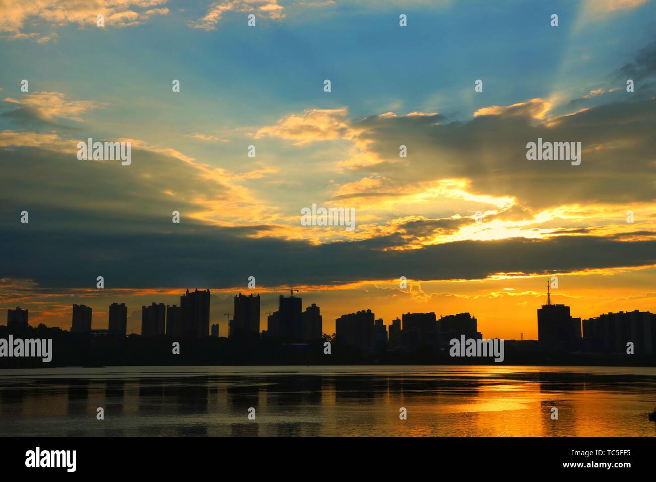 The setting sun, the light and the shadow Stock Photo - Alamy