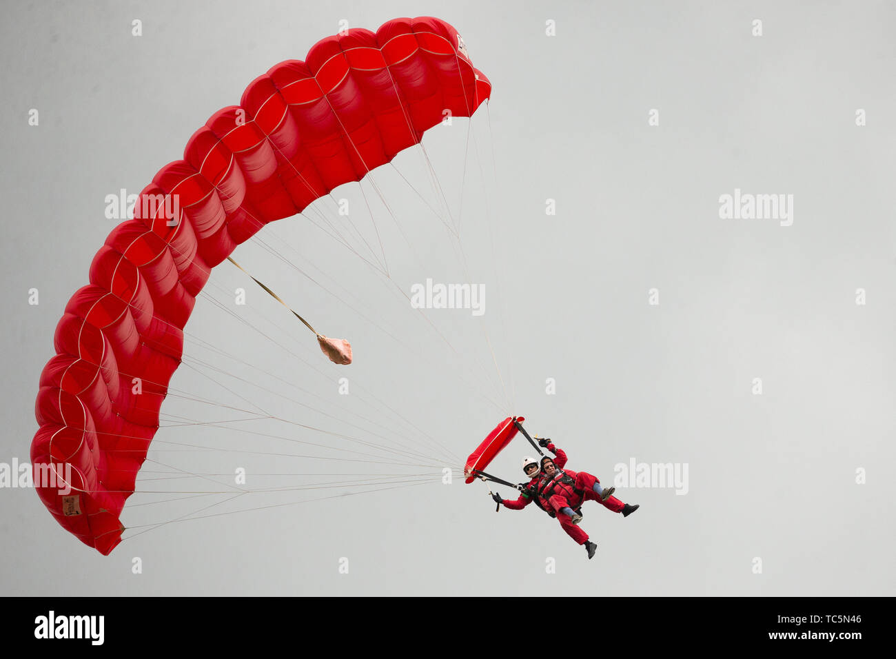 Veteran Harry Read, 95, completing his tandem parachute jump with the ...