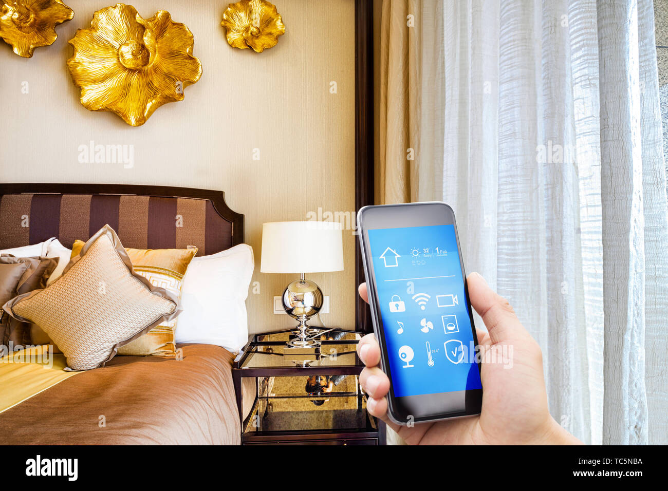 smart phone with smart home with modern bedroom Stock Photo - Alamy