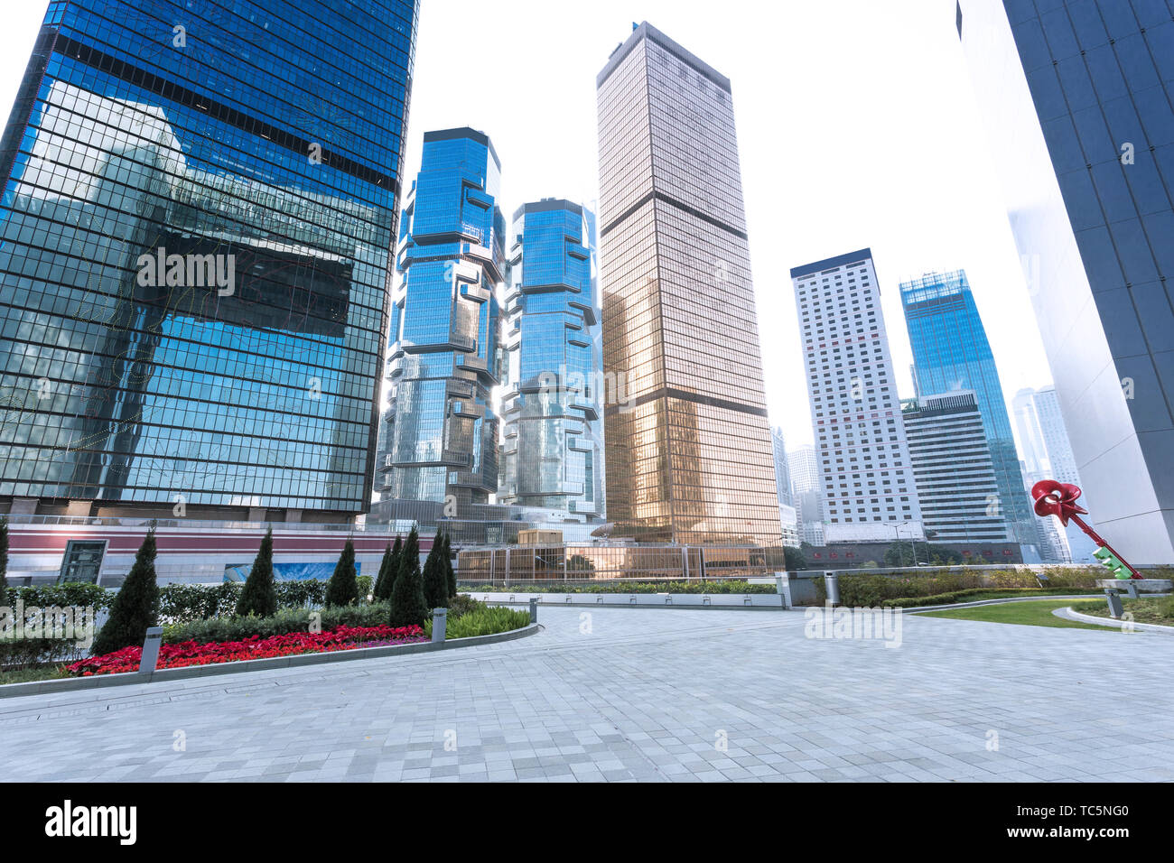empty pavement and skyscrapers in modern city Stock Photo - Alamy