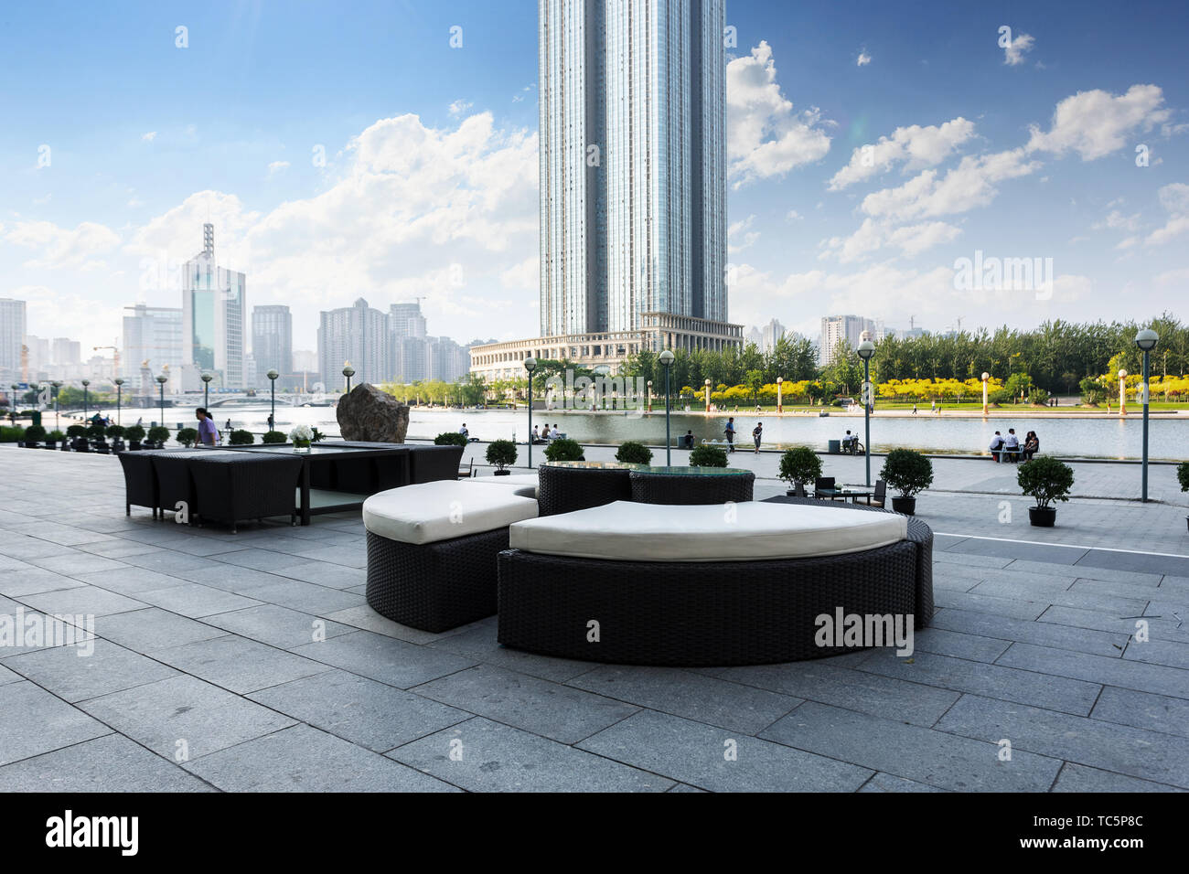 Modern buildings and public square with seats Stock Photo - Alamy