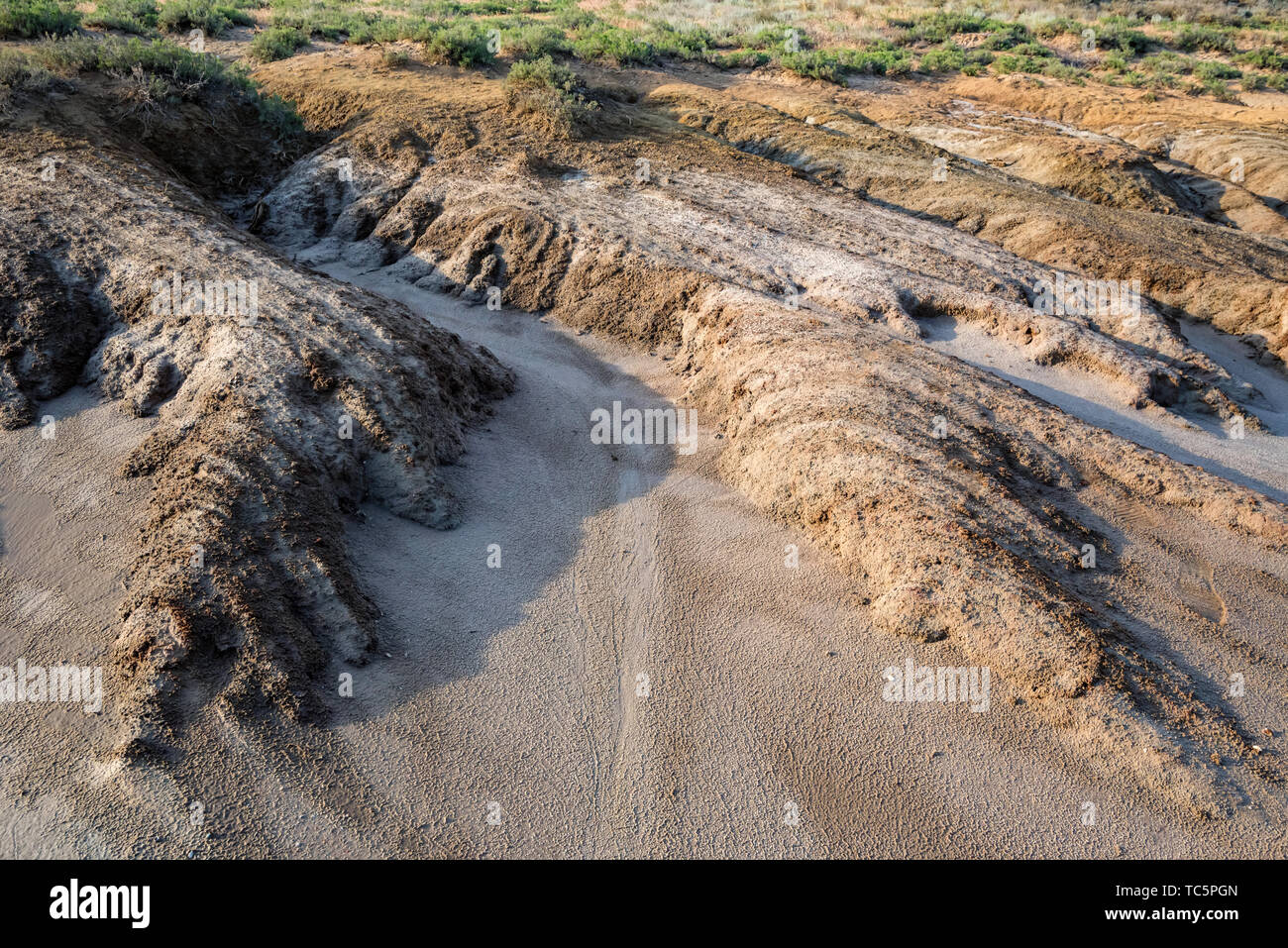 View of soil erosion near saline lake Baskunchak, Russia Stock Photo ...