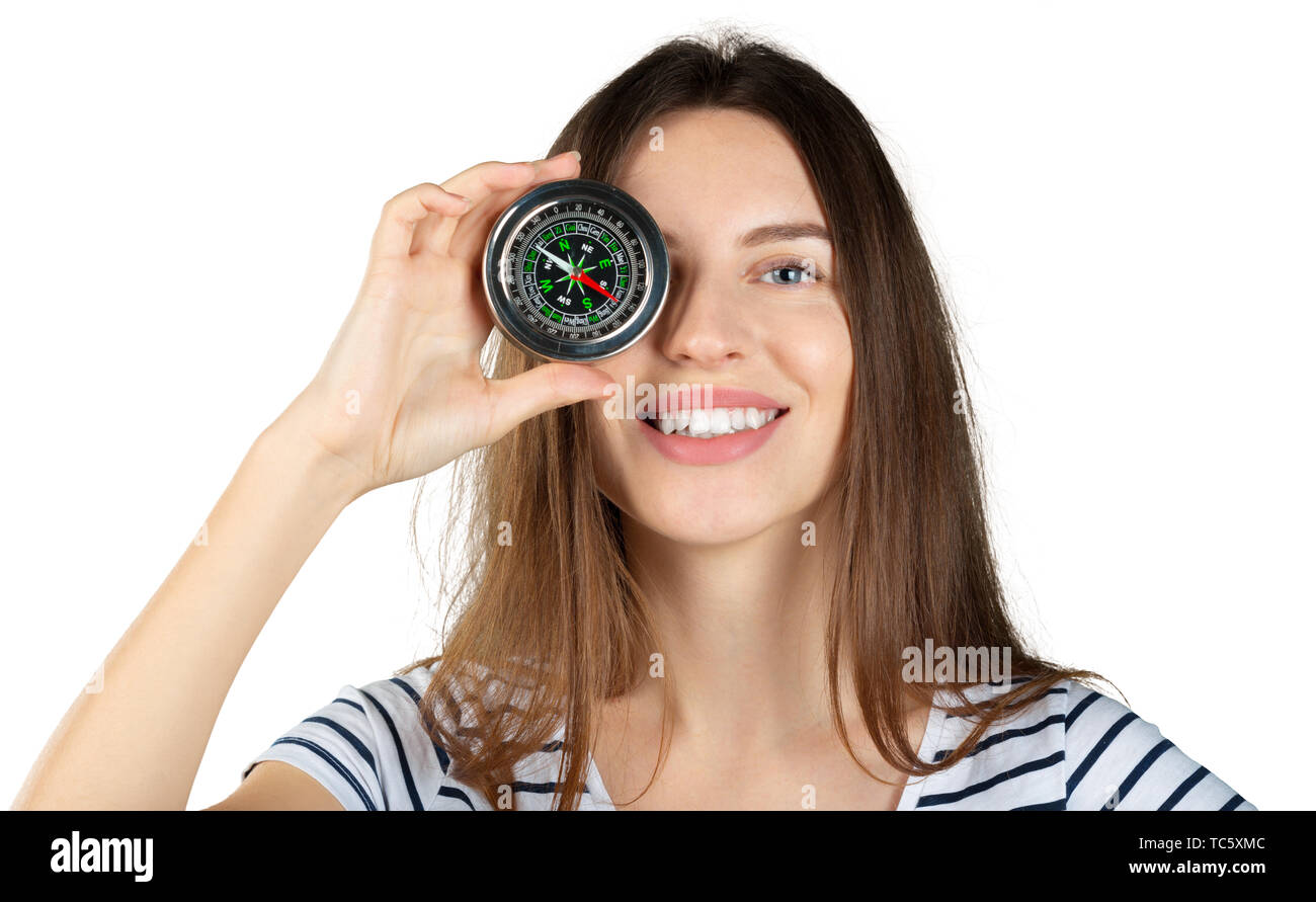 Young woman with a compass isolated on white background Stock Photo - Alamy