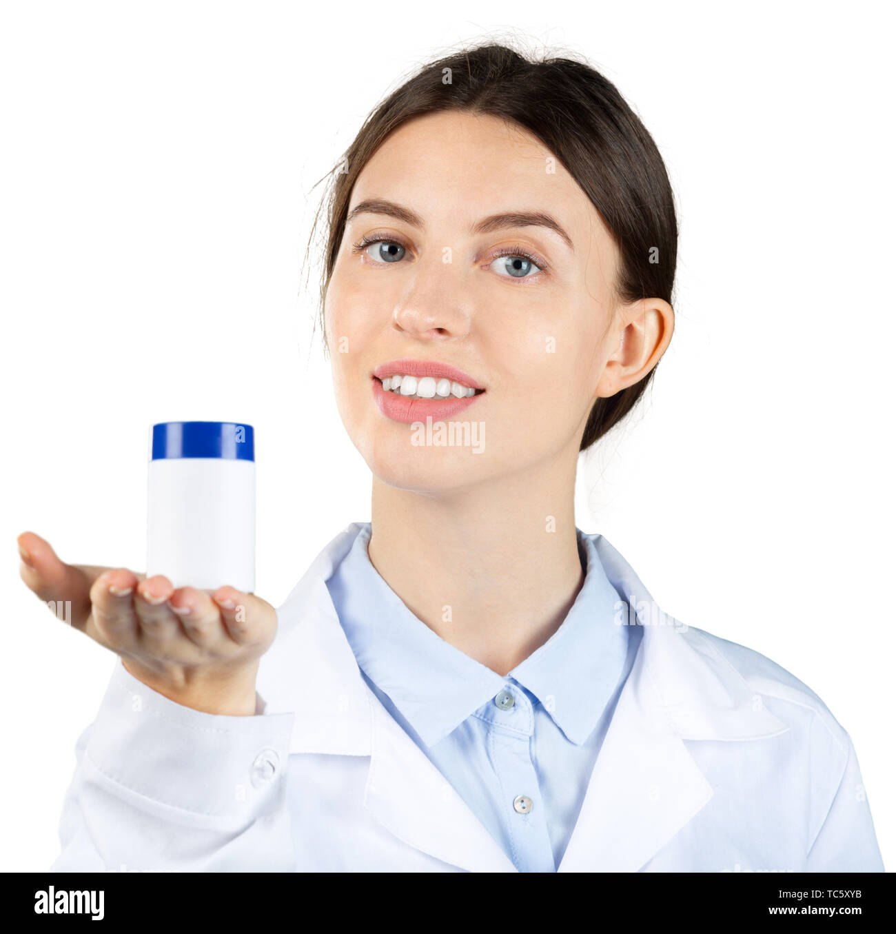 Young woman doctor making presentation of a medicine isolated on white ...