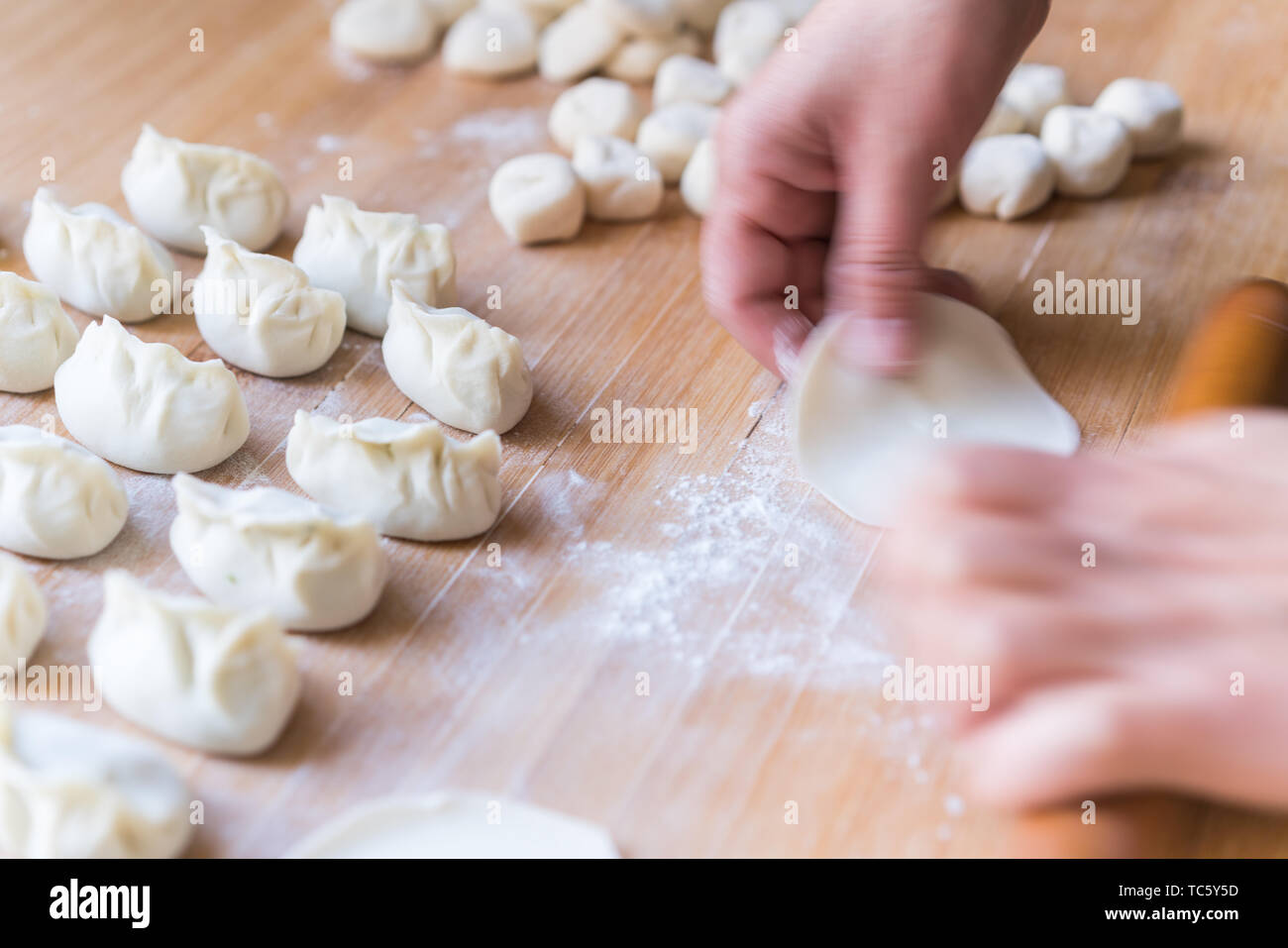 The making process of making dumplings and rolling dumplings Stock ...