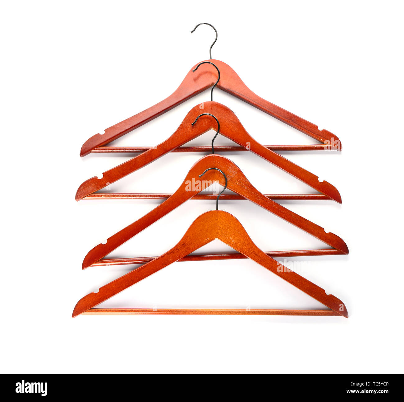 Clothes hangers on white background Stock Photo - Alamy