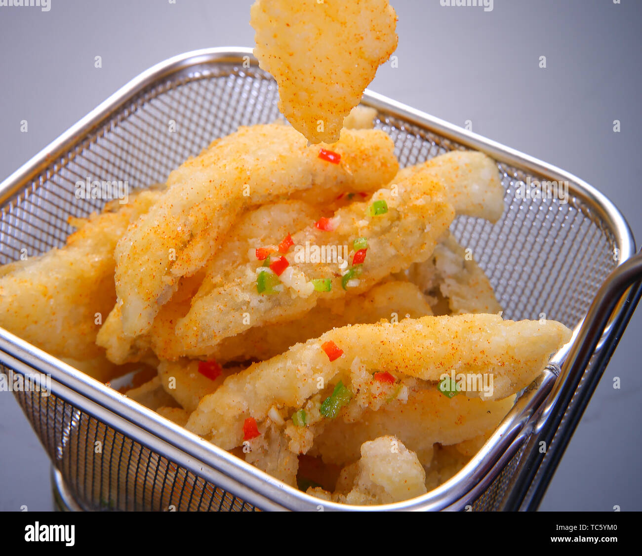 Pepper, salt, nine-bellied fish Stock Photo - Alamy