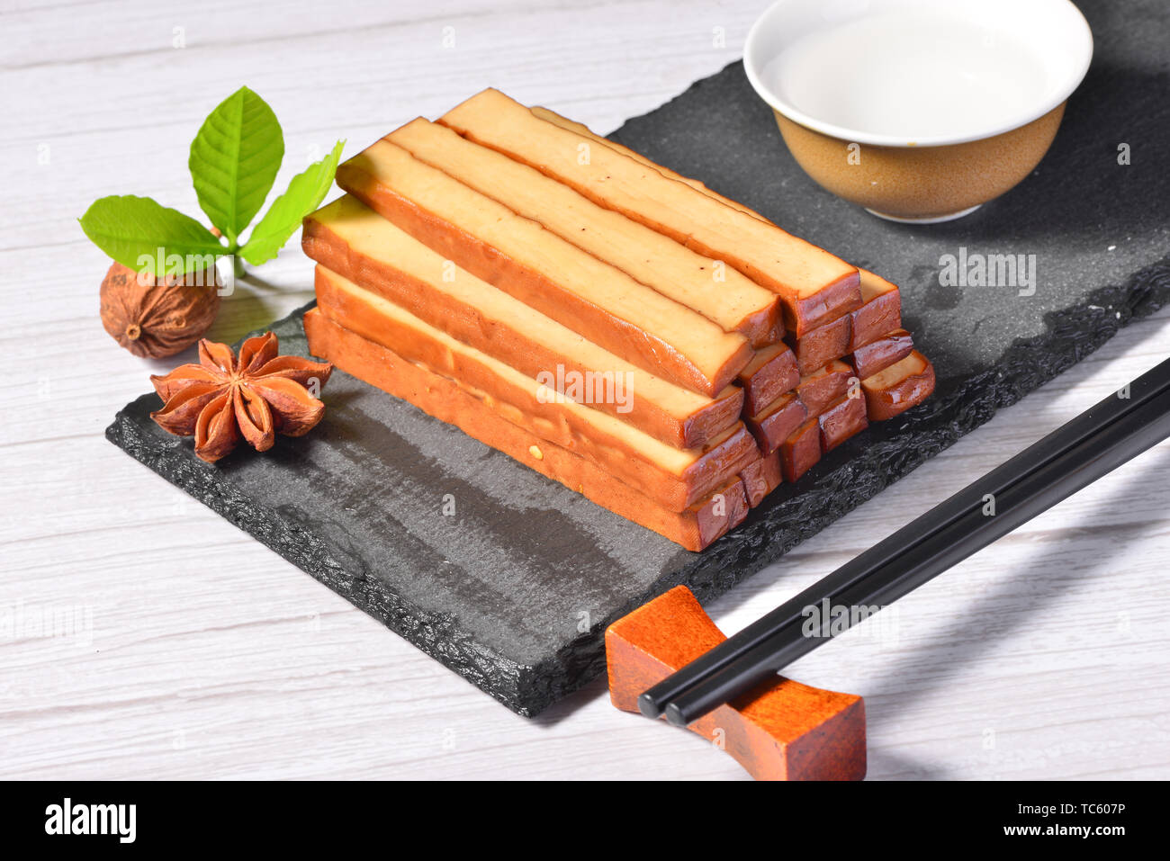 Spiced dried tofu Stock Photo - Alamy