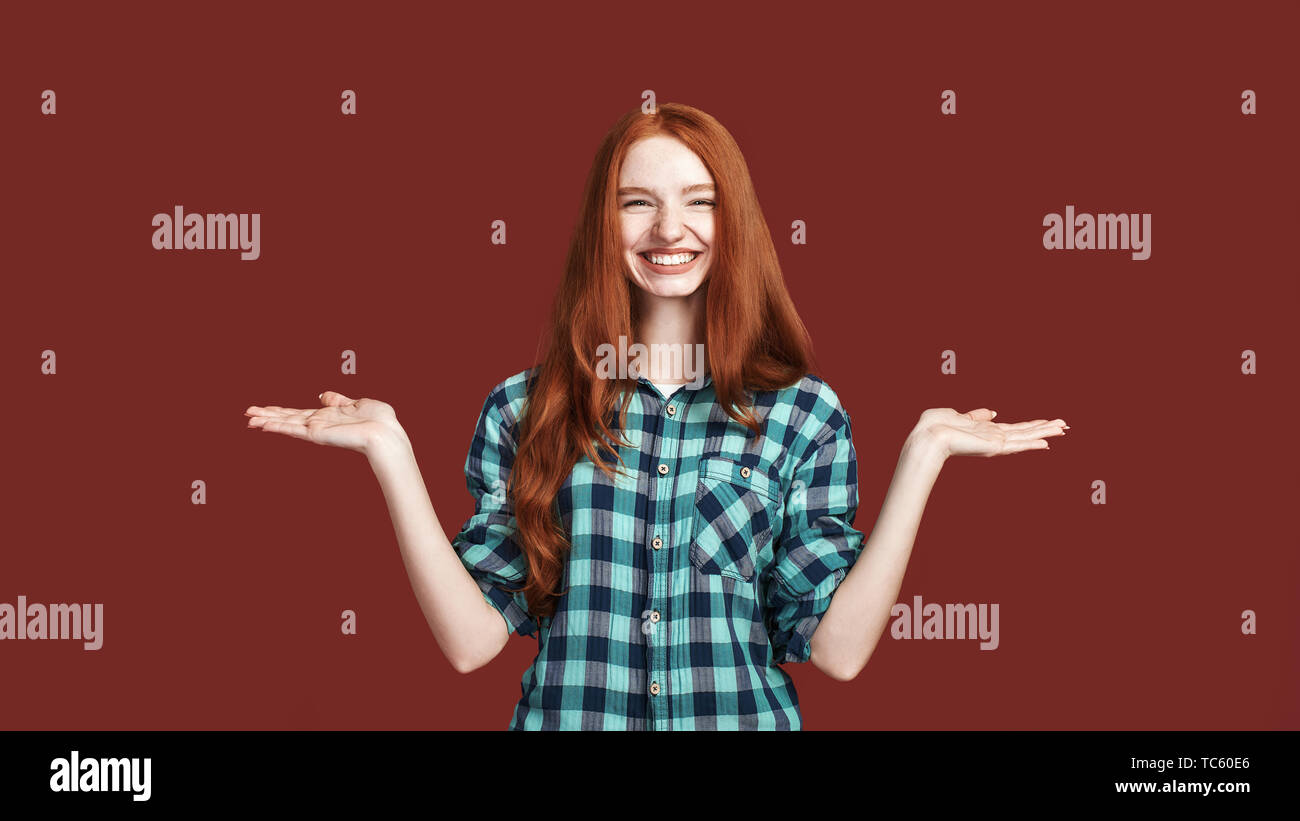 Portrait of young beautiful woman juggling hand position for throwing ...