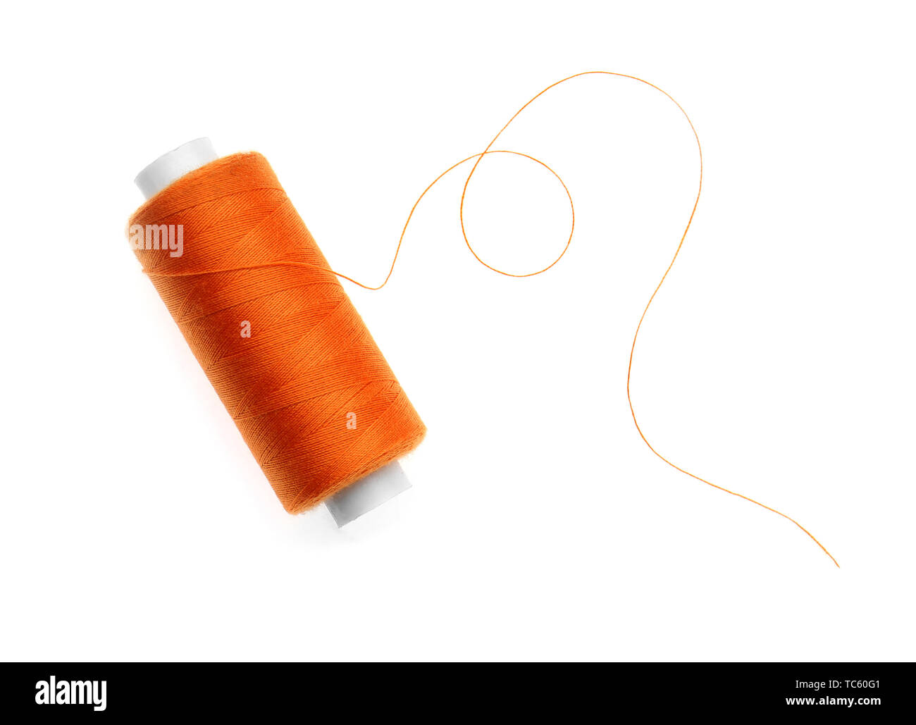 Sewing thread spool on white background Stock Photo - Alamy