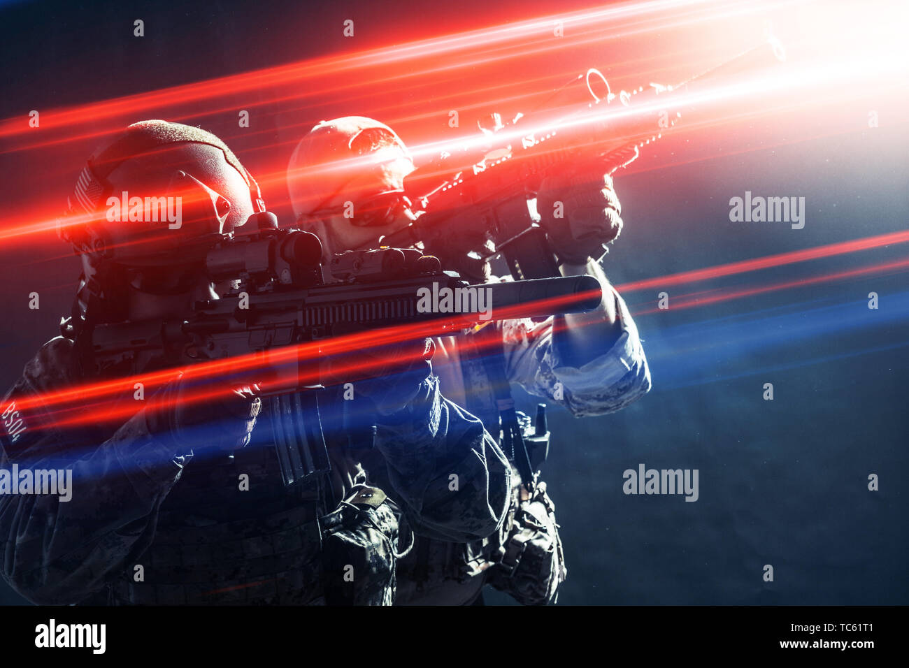 Group of security forces in Combat Uniforms with rifles Stock Photo - Alamy