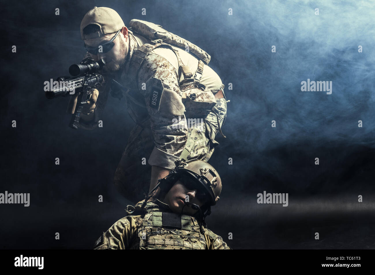 Group of security forces in Combat Uniforms with rifles Stock Photo - Alamy